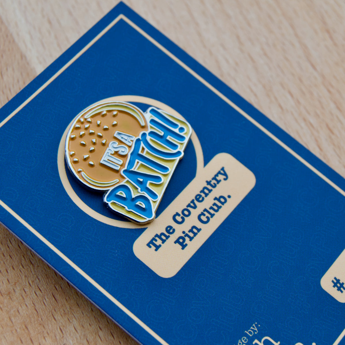 It's a Batch pin badge – Etch & Pin