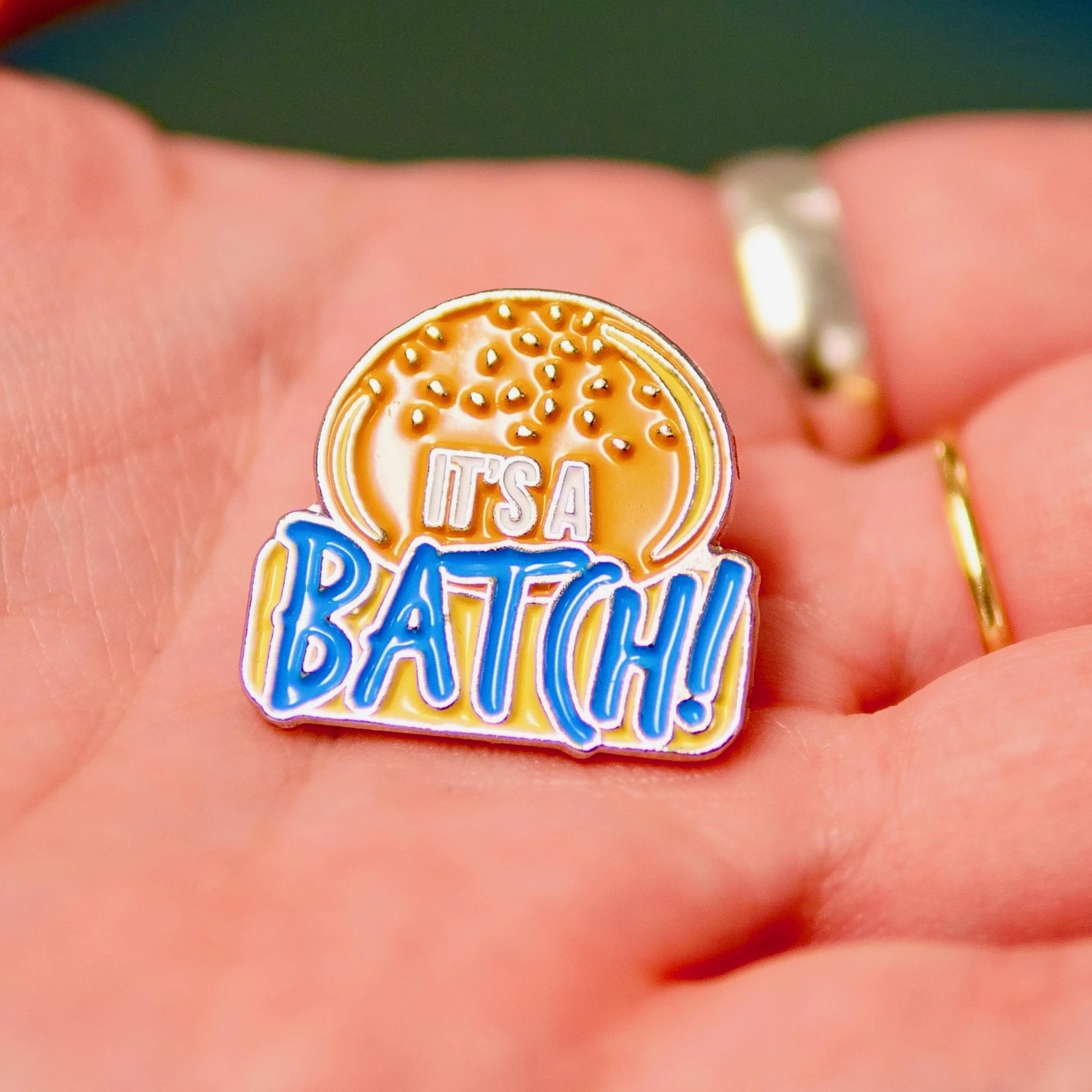 It's a Batch pin badge – Etch & Pin